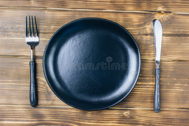 Intermittent Fasting Concept with Empty Black Plate Stock Image - Image ...