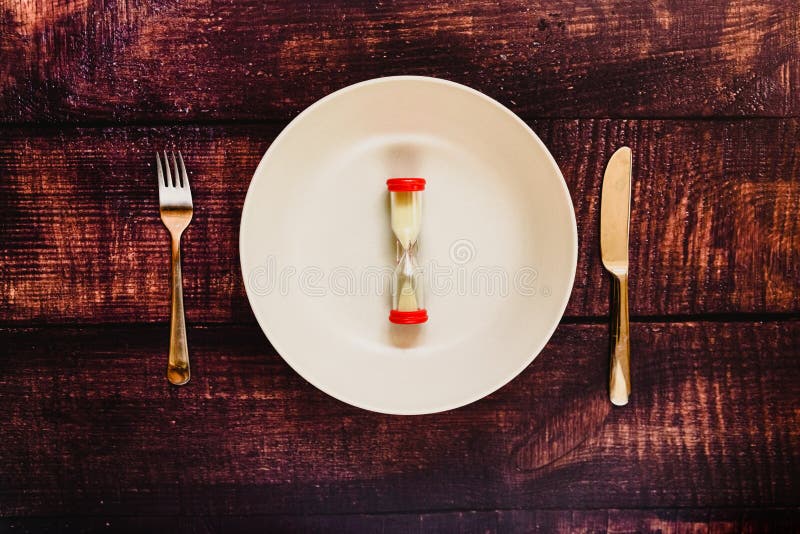 Intermittent Fasting Diet To Lose Weight Illustrated with an Empty ...