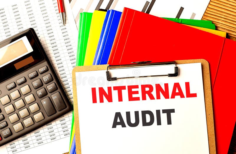 INTERNAL AUDIT is Written on Wooden Blocks on a Chart Background Stock ...