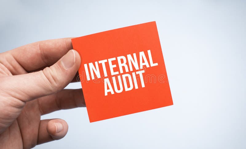INTERNAL AUDIT Word on Paper in Businessman Hands Stock Image - Image ...