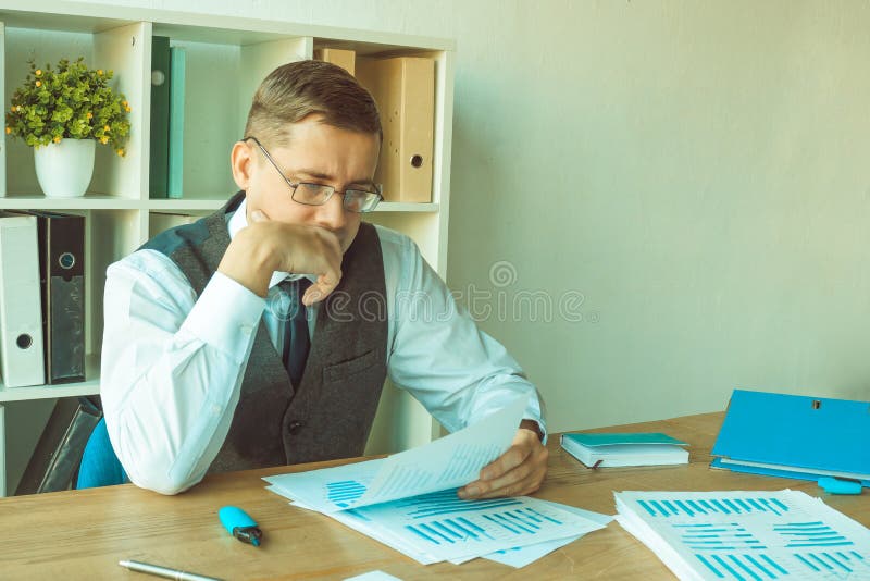 Financial Audit Report and Magnifying Glass on a Desk. Stock Photo ...