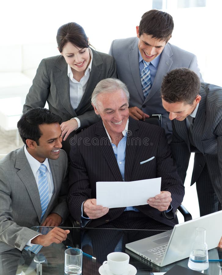 International Business People Studying a Document Stock Image - Image ...