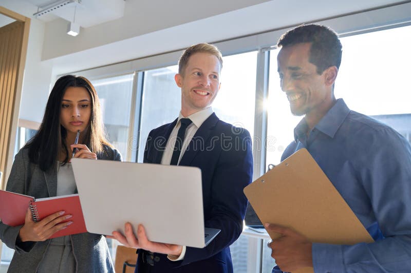 International Business Team People Using Laptop Standing in Office ...