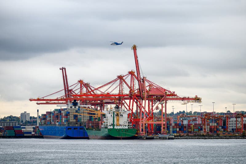 International Cargo Ship with Containers Cargo Cranes and Helicopter ...