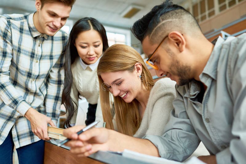 Young International Students Talking in University Lobby Stock Photo ...