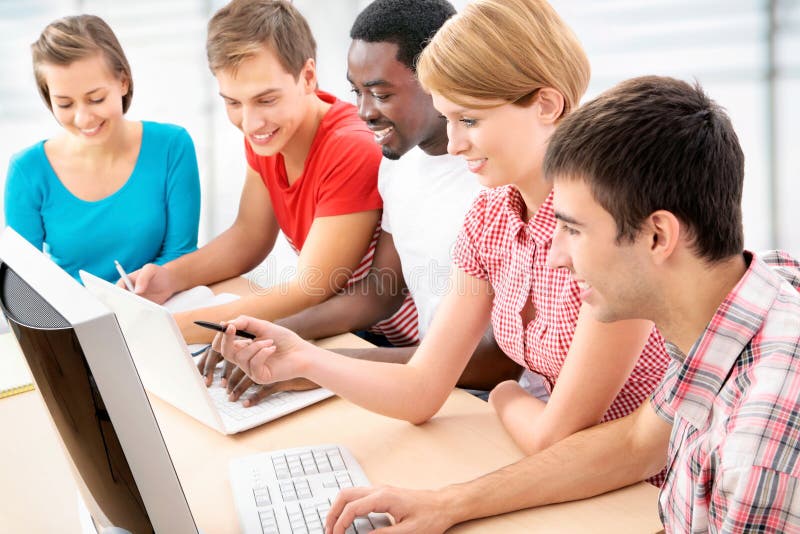 Diverse Group of College Students/friends Looking at a Computer Stock ...