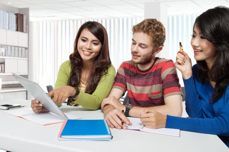 Group of Students Using Mobile Phone Stock Photo - Image of success ...