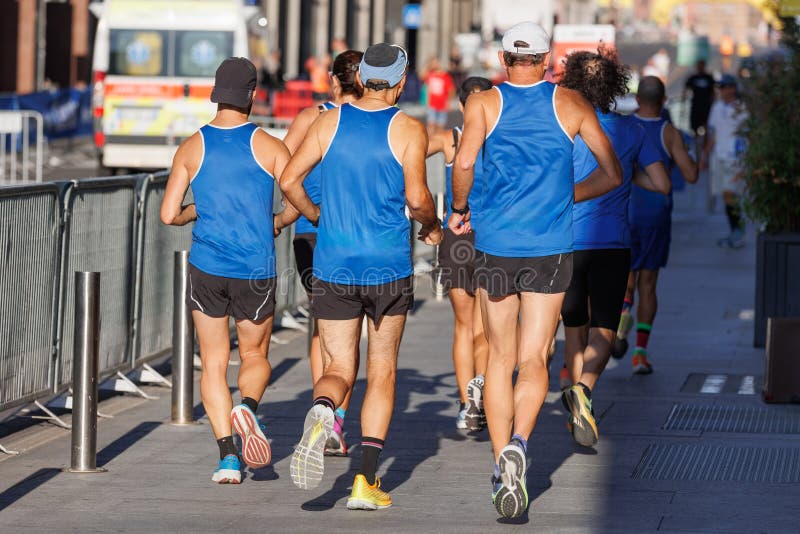 International Marathon Running Race, Rear View of Running Man Editorial ...