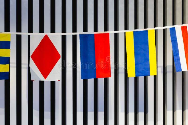 International Maritime Signal Flags on the Wall Stock Image - Image of ...