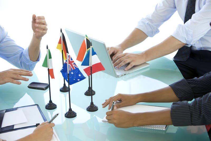 International Meeting with Flags on Table Stock Image - Image of ...