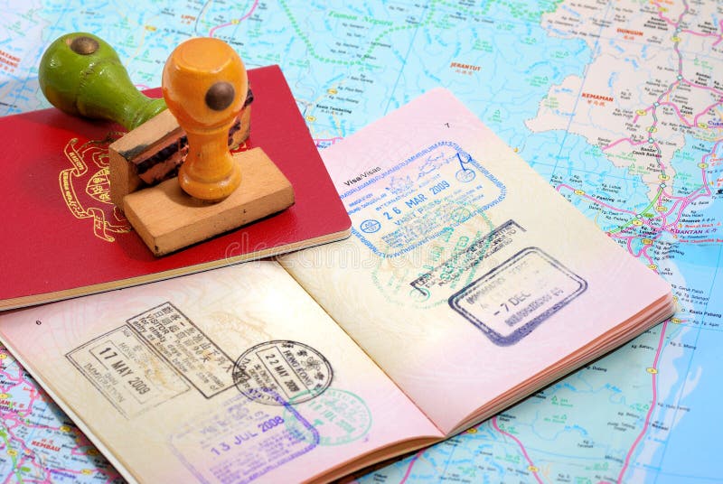 Opened Passport With Visas Stamps Seals World Map Travel Or Tourism