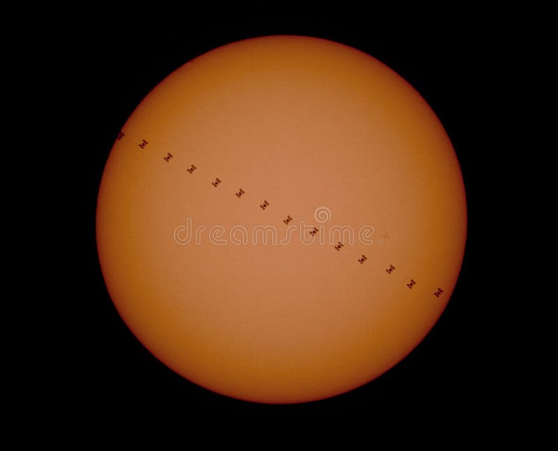 International Space Station (ISS) Transits Across the Disk of the Sun ...