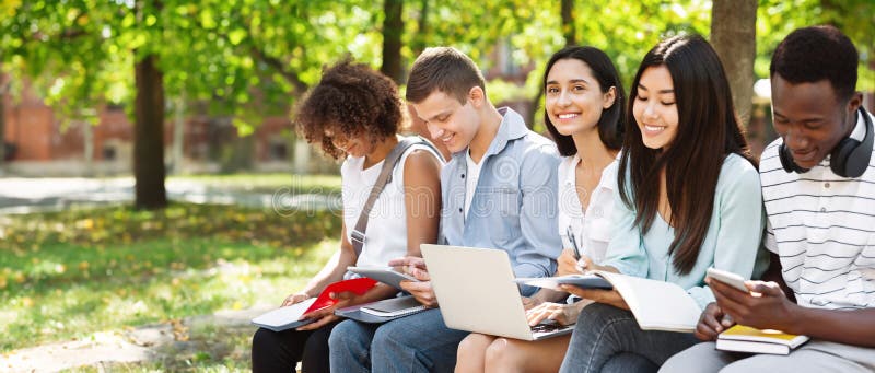 International Students Preparing for Classes Together in University ...