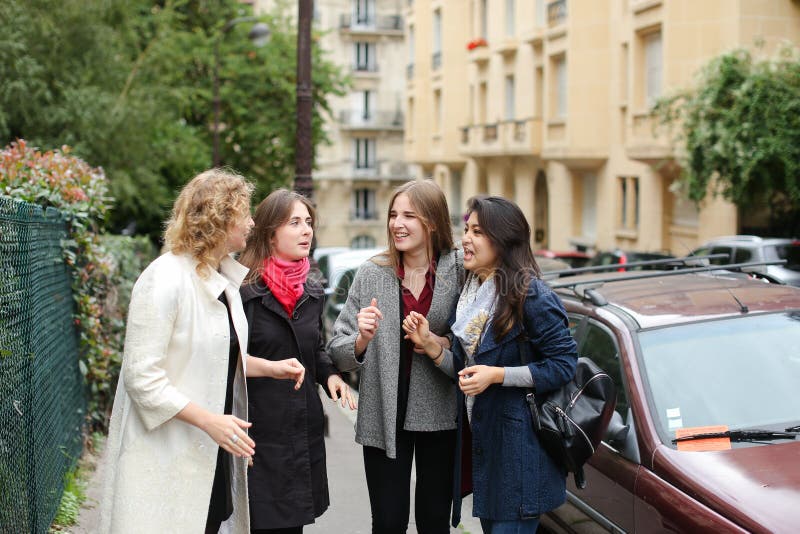 International Students Talking with Teacher Outdoors in . Stock Image ...