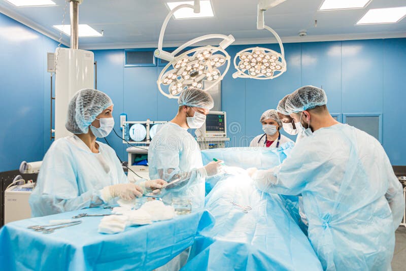 An International Team of Doctors Performs a Complex Surgical Operation ...