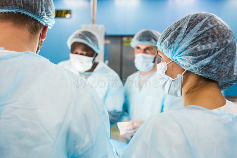 An International Team of Doctors Performs a Complex Surgical Operation ...