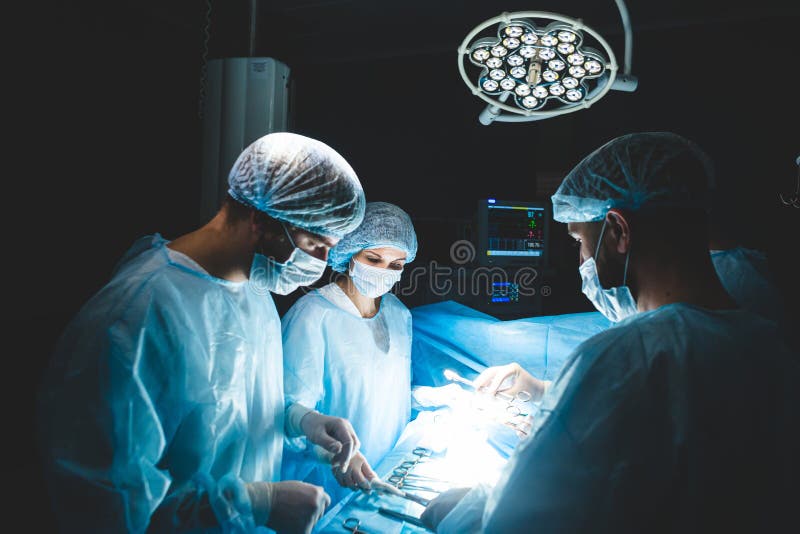 An International Team of Doctors Performs a Complex Surgical Operation ...