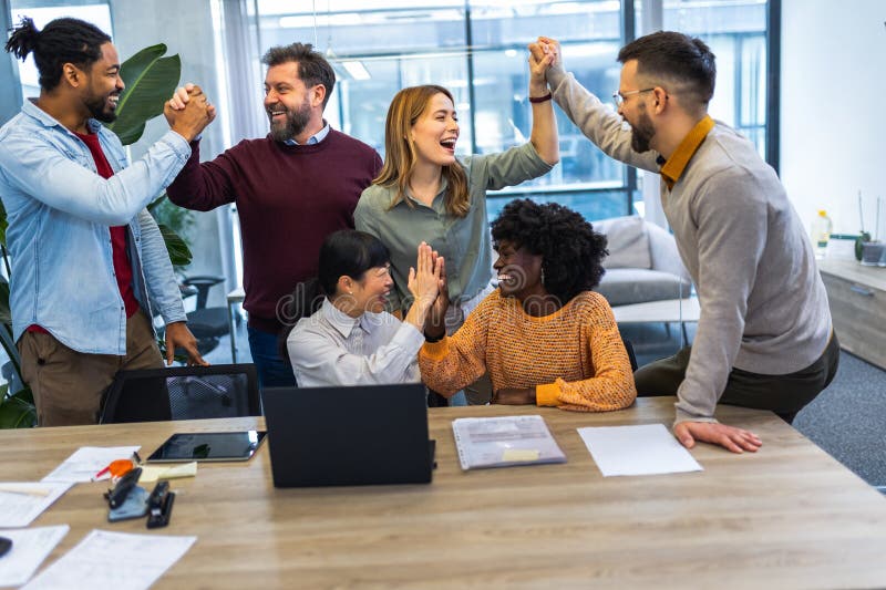 International Workers Group High Five after Finishing Important Project ...