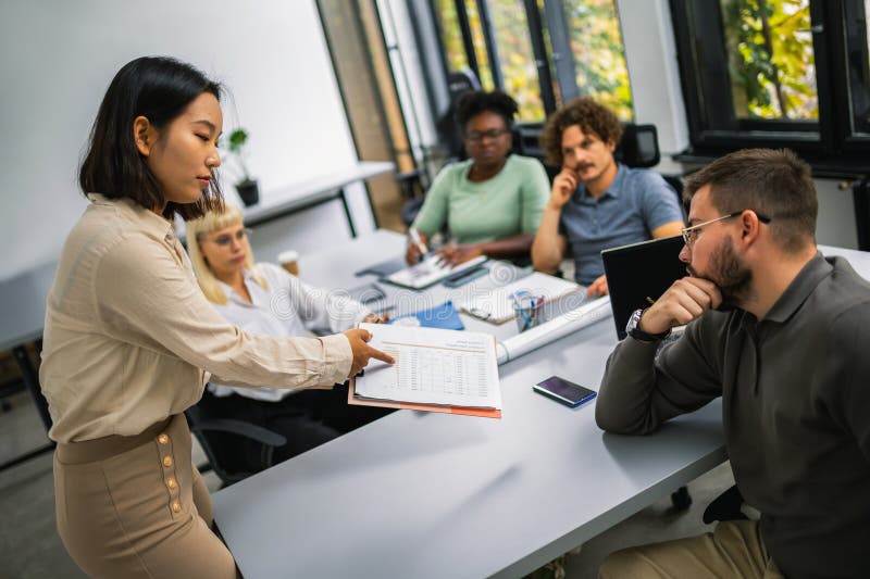 International Workers Group and Team Leader Having Teamwork Discussion ...