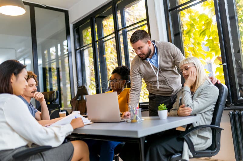 Group and Team Leader Having Teamwork Discussion Managing Project at ...