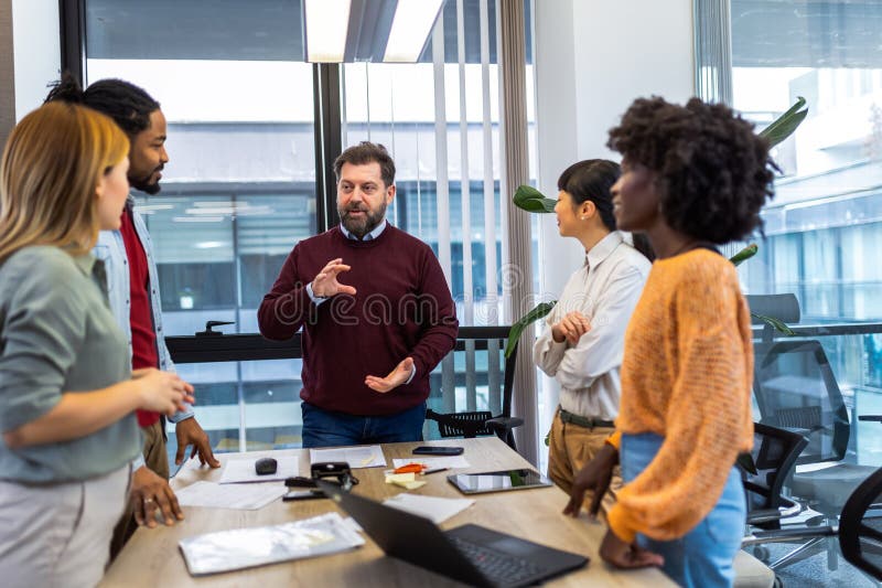 Group and Team Leader Having Teamwork Discussion Managing Project at ...