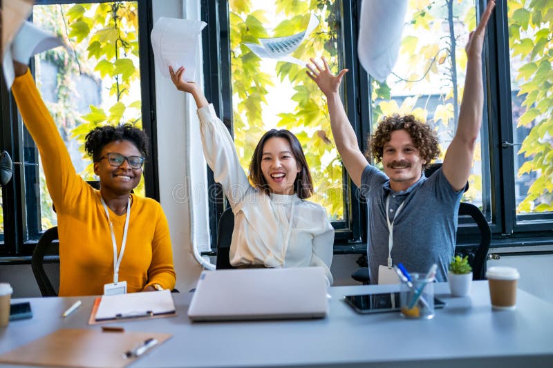 International Workers Group Throwing All the Paperwork after Being Done ...