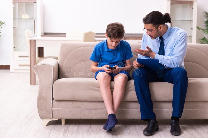 Internet Addicted Boy Visiting Male Doctor Stock Photo - Image of ...