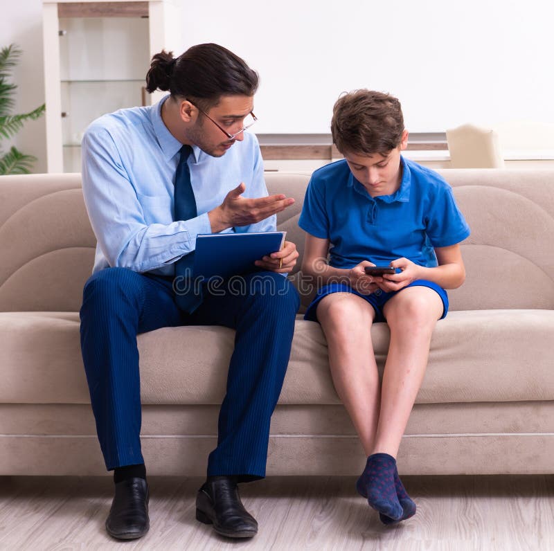 Internet Addicted Boy Visiting Male Doctor Stock Image - Image of ...