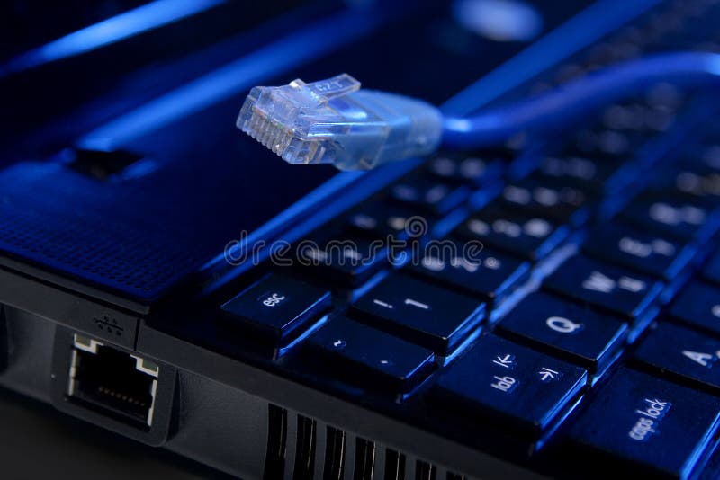 Internet Cable with the Laptop in Dark Blue Colour Stock Photo - Image ...