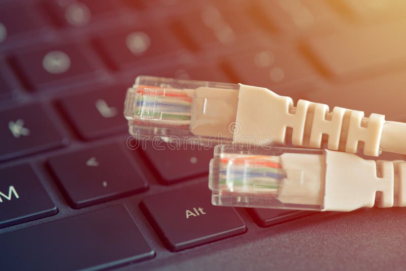 Internet Cable Lies on the Keyboard. Concept Technologies and Internet ...