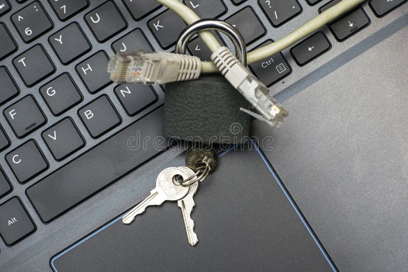 Internet Cable Passing through a Closed Iron Lock with Keys on a Laptop ...