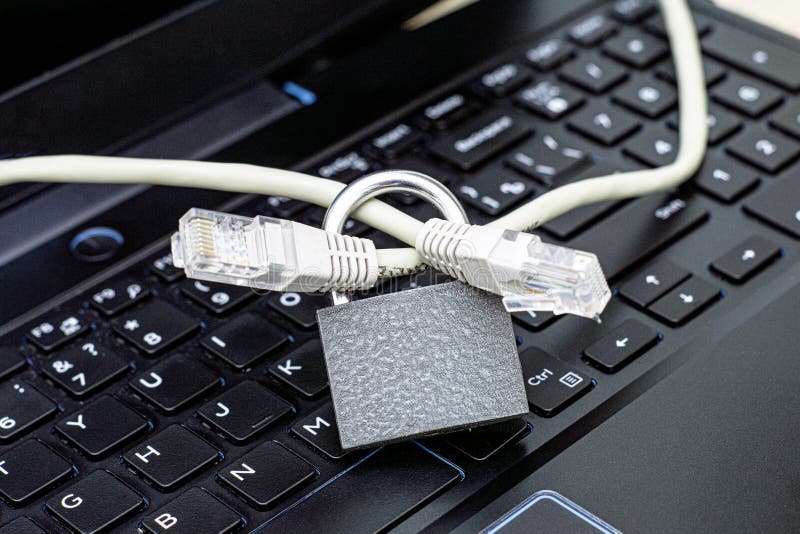 Internet Cable Passing through a Closed Iron Lock on a Laptop Keyboard ...