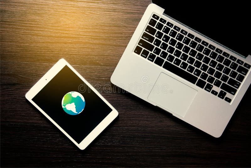 Internet Communication Globe in the Device Screen Stock Photo - Image ...