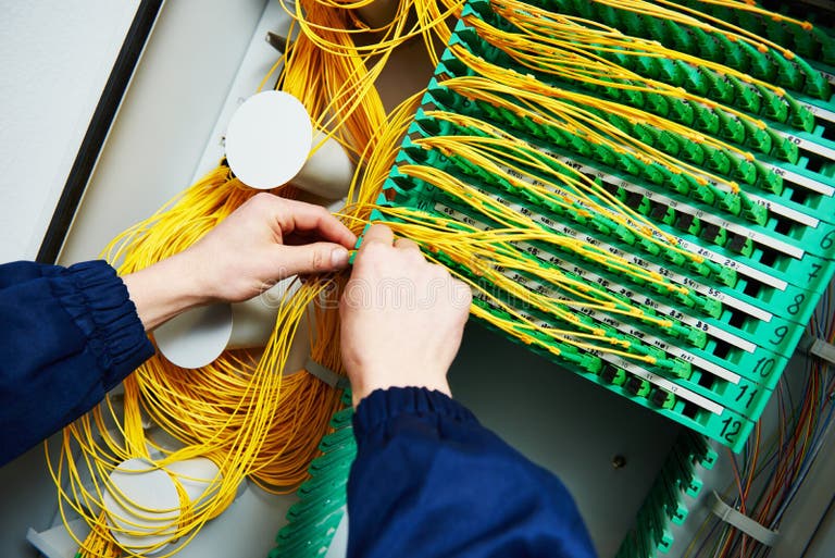 Internet Connection. Engineer Connecting Fiber Optic Cables Stock Image ...
