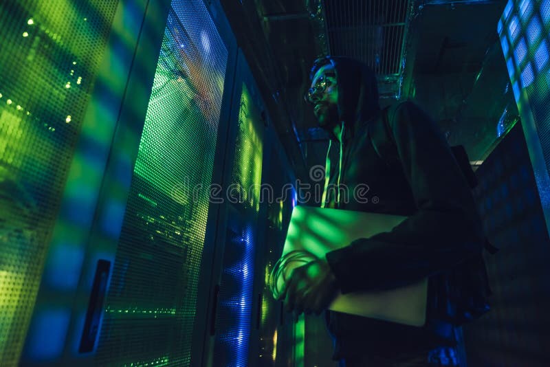 Hacker in data centre stock photo. Image of code, criminal - 104995466