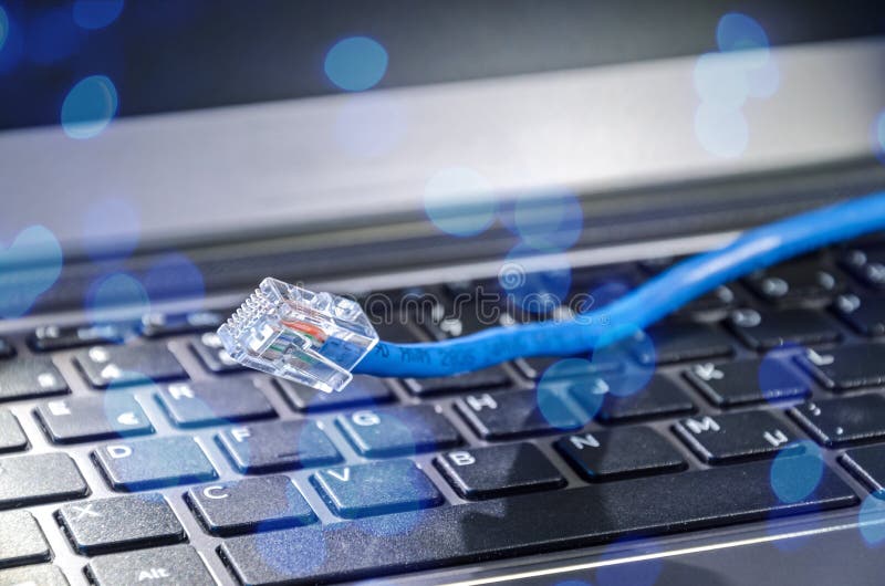 Internet Cable Tied into Knot Lying on Computer Keyboard Symbolizing ...