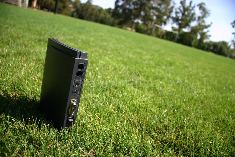 Internet Modem on Green Grass Stock Photo - Image of digital, object ...
