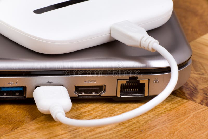 Internet modem on laptop stock image. Image of metal - 47290627