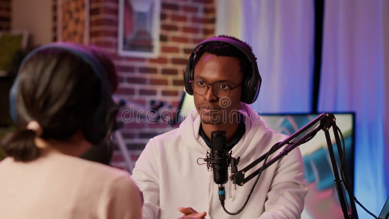 Internet Podcaster Reading Question from Laptop Screen Talking Using ...