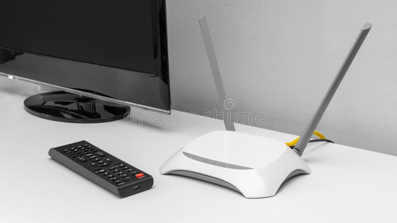 Internet Router Next To the TV on the Table in the Living Room. Stock ...