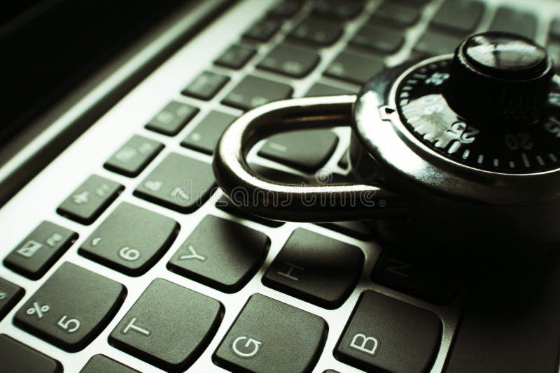 Internet Security with Black Number Dial Lock on Laptop Keyboard High ...