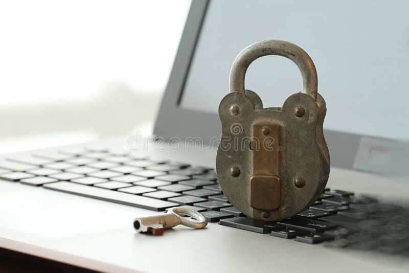 Internet Security Concept-old Padlock and Key on Laptop Computer Stock ...