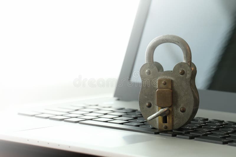 Internet Security Concept-old Padlock and Key on Laptop Computer Stock ...