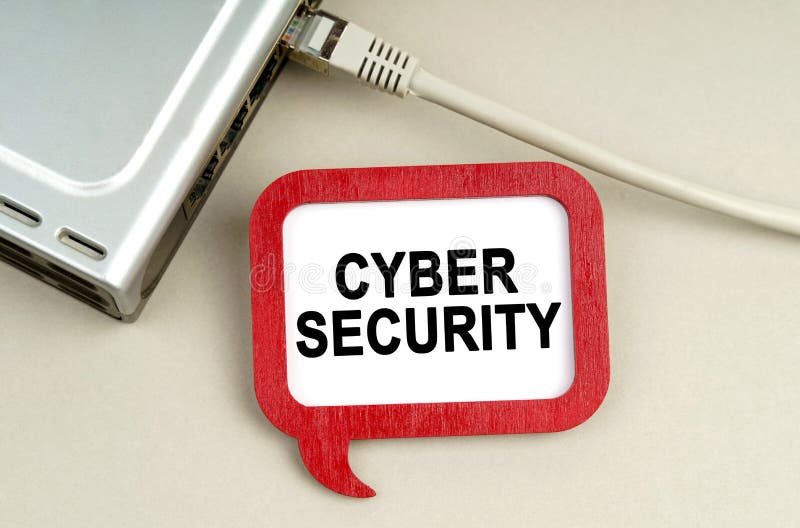 There is a Router Connected To the Network on the Table, Next To a Sign ...