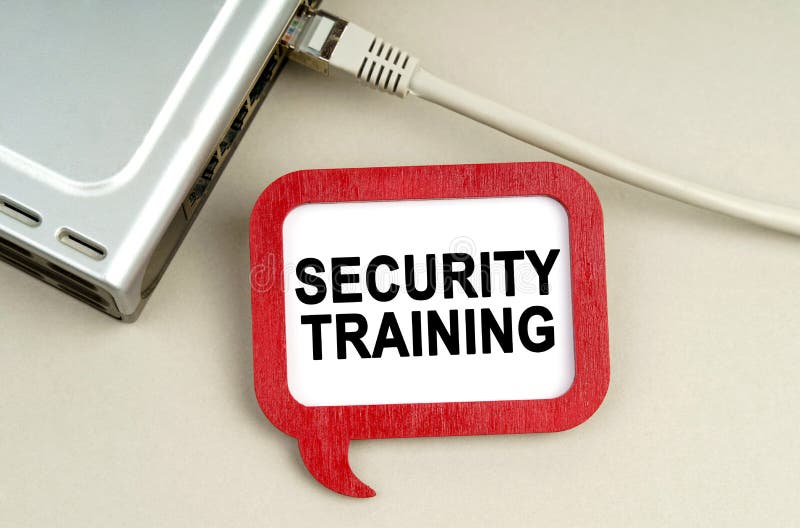 There is a Router Connected To the Network on the Table, Next To a Sign ...