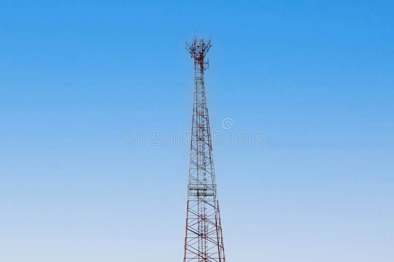 Internet Signal Tower or Mobile Phone Signal Tower Isolated on Blue Sky ...