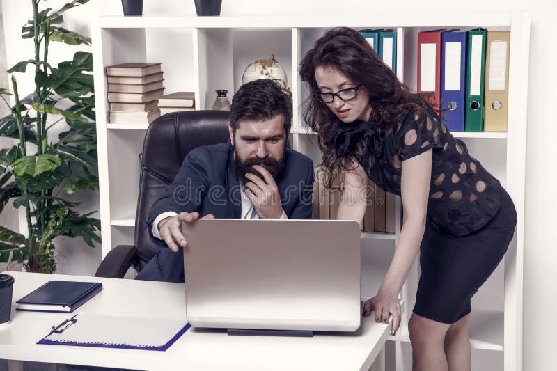 Internet Surfing. Business Couple Work on Computer in Office. Employees ...