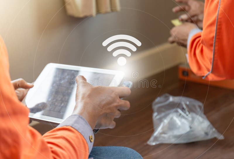 An Internet Technician is Repairing or Maintaining a Fiber Optic ...