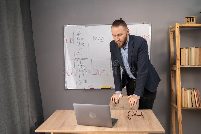 Internet Technology and Education Concept. Male Teacher Teaching Online ...