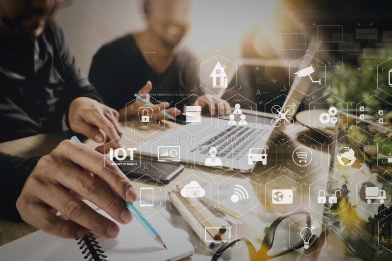 Co Worker Using VOIP Headset with Digital Tablet Computer Docking Smart ...